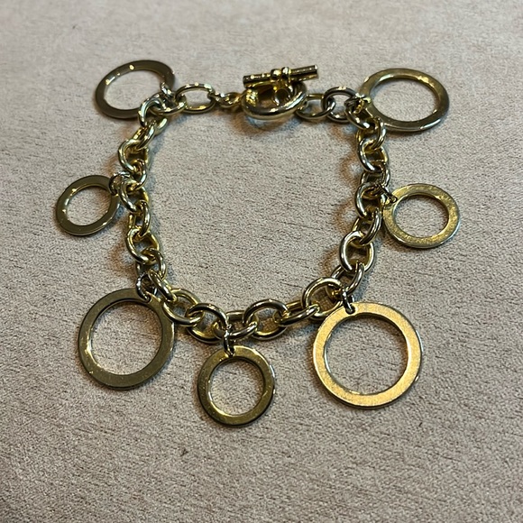 Vintage | Jewelry | Vintage Dangling Golden Rings Bracelet With Toggle Catch | Poshmark